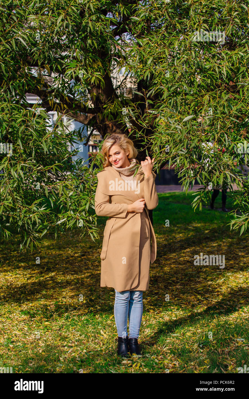 Lady under maple tree hi-res stock photography and images - Alamy