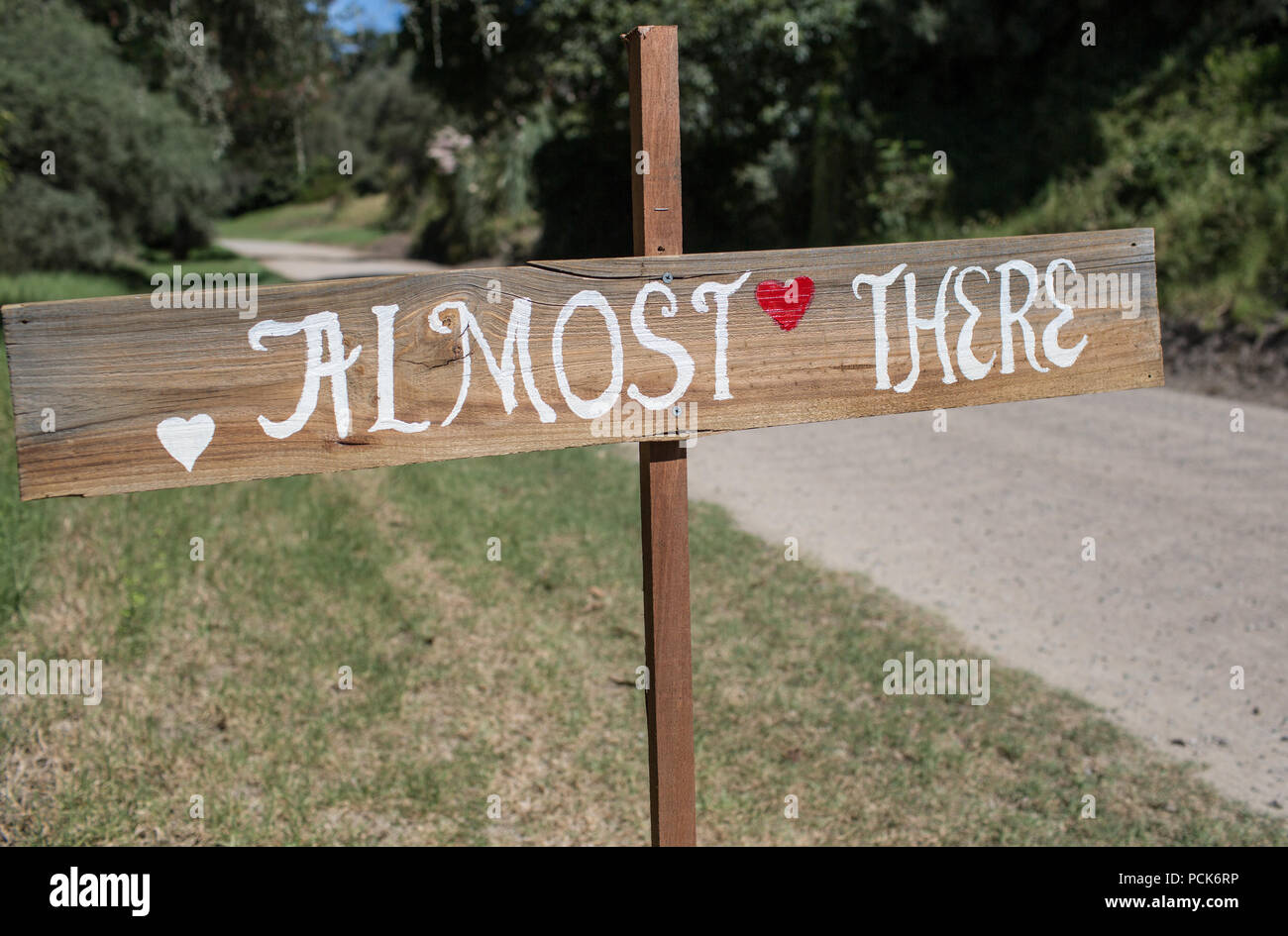 Hand painted signs at a rustic eco friendly wedding, Australia Stock ...