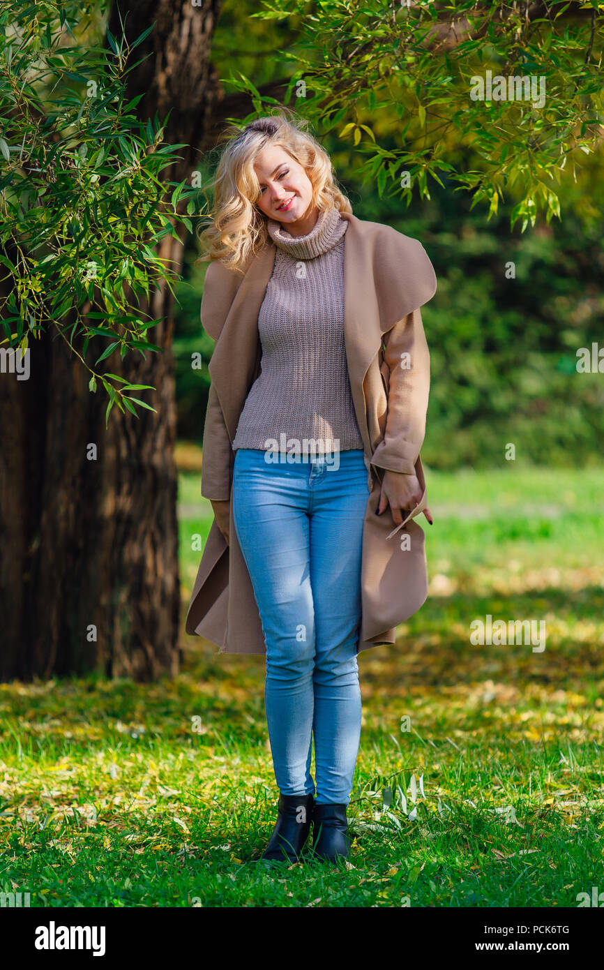 Lady under maple tree hi-res stock photography and images - Alamy