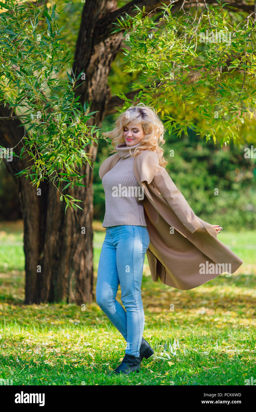 Lady under maple tree hi-res stock photography and images - Alamy