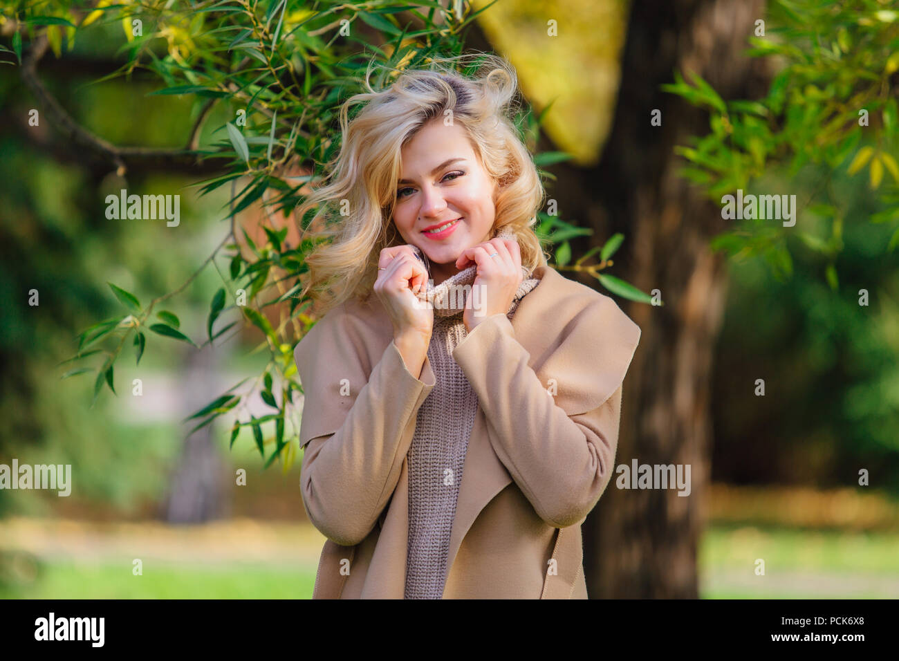 Lady under maple tree hi-res stock photography and images - Alamy