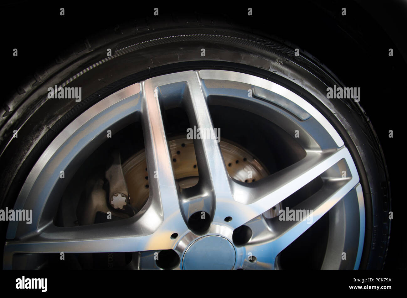 Luxury alloy wheel in close-up as an automotive Stock Photo - Alamy
