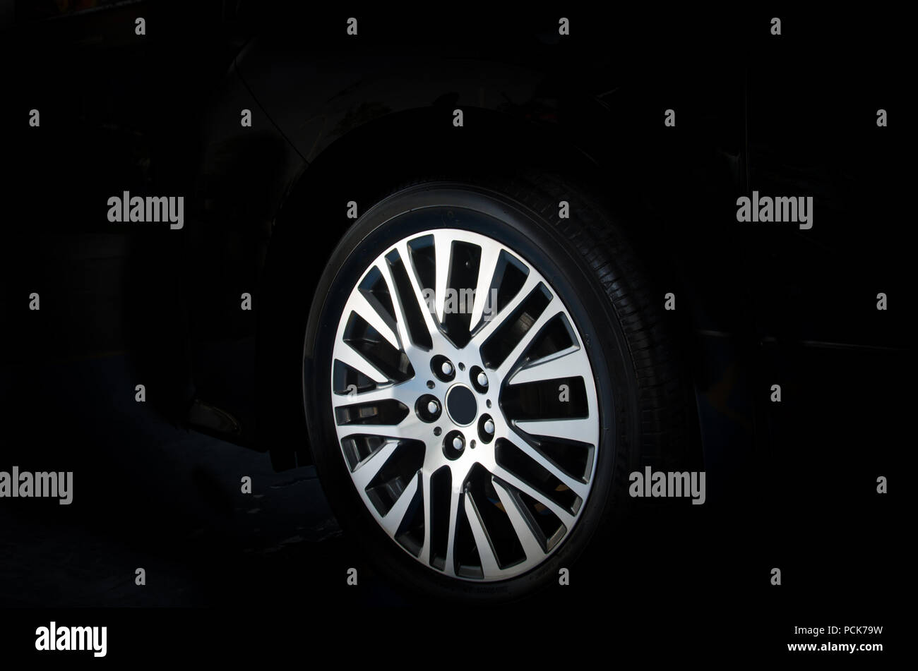 Luxury alloy wheel in close-up as an automotive Stock Photo - Alamy