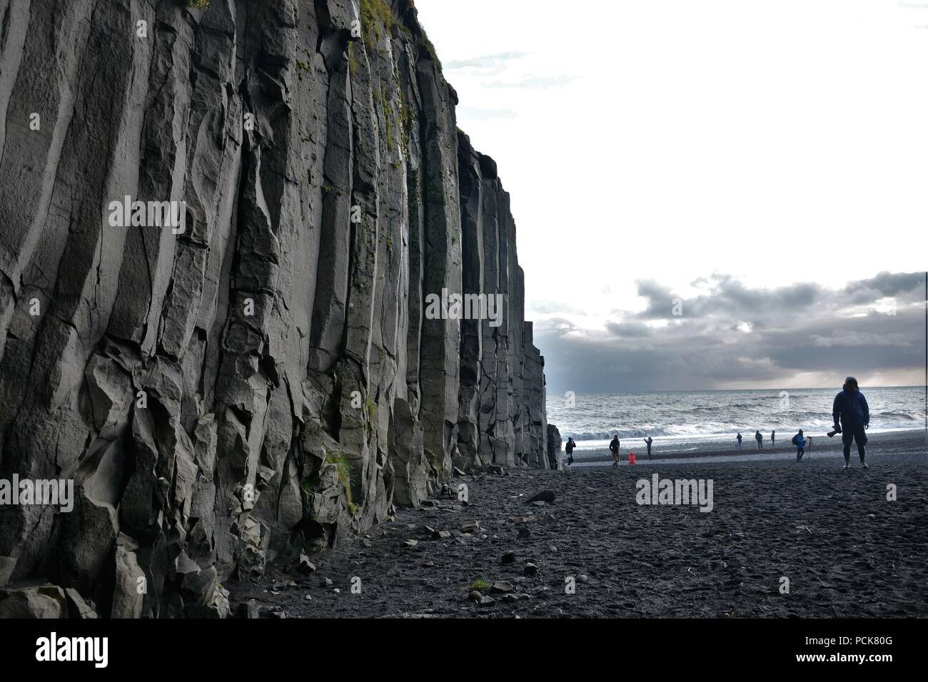 Sea Stacks, cliffs and caves at Black Sand Beach, Reynisfjara ...