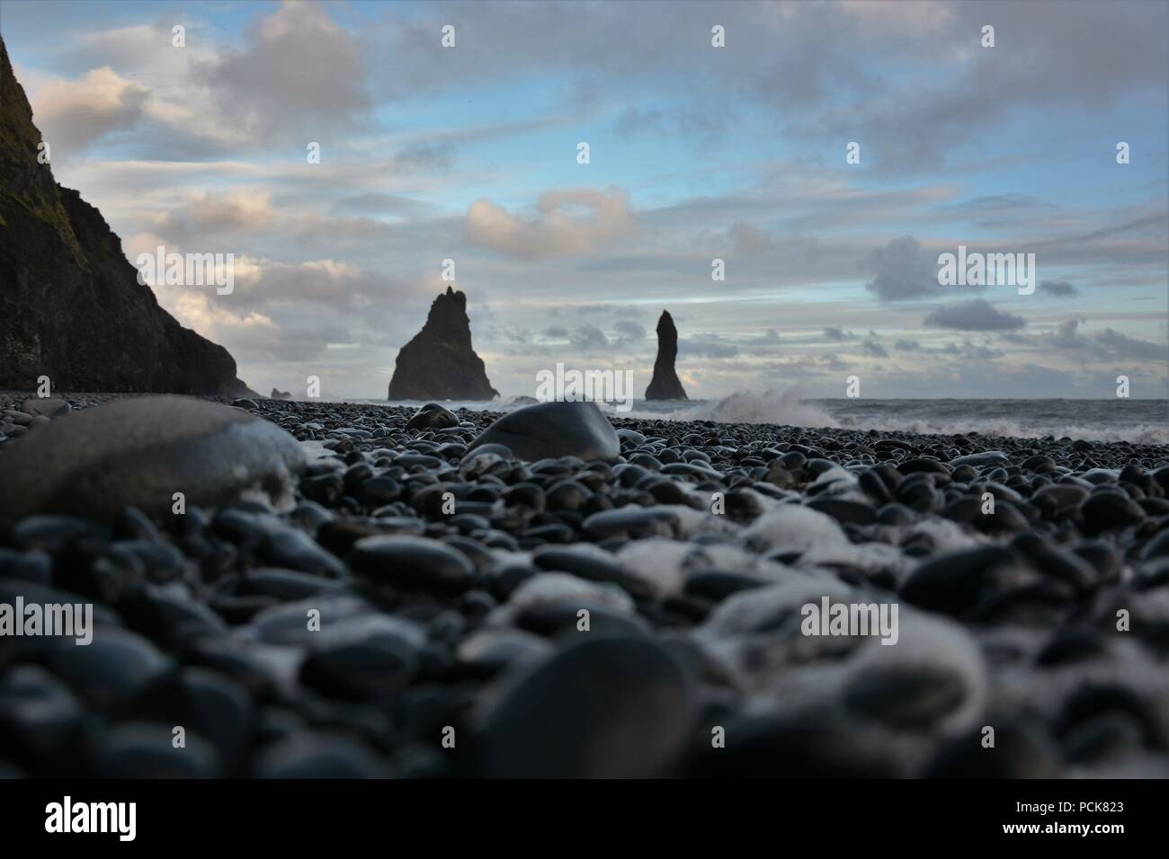 Sea Stacks, cliffs and caves at Black Sand Beach, Reynisfjara ...