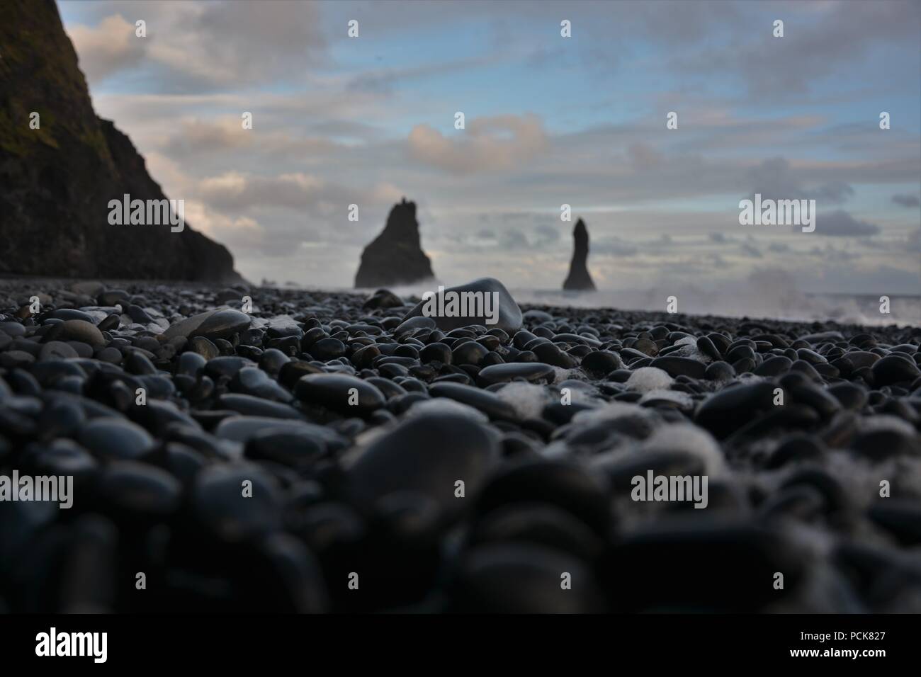 Sea Stacks, cliffs and caves at Black Sand Beach, Reynisfjara ...