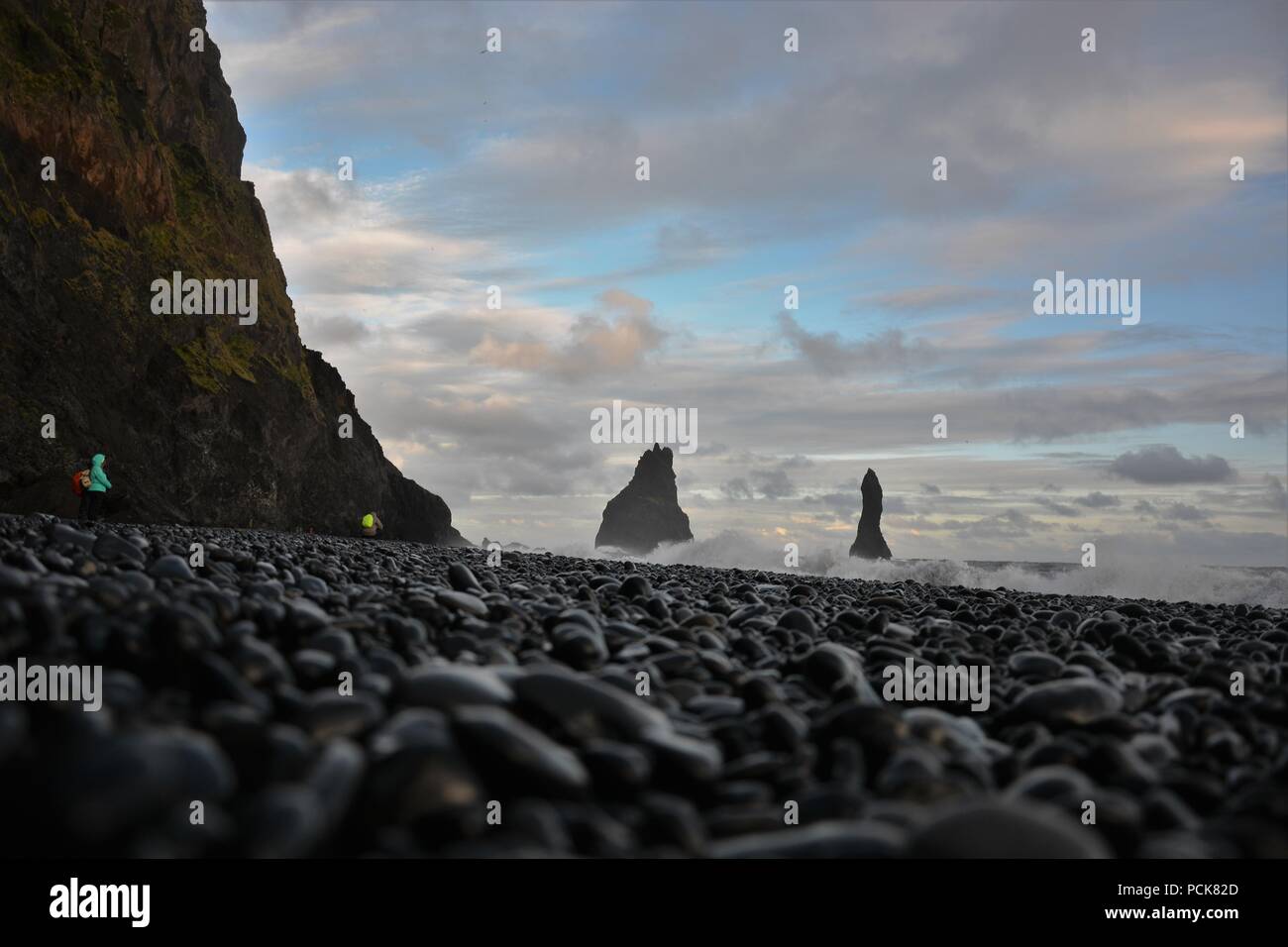 Sea Stacks, cliffs and caves at Black Sand Beach, Reynisfjara ...