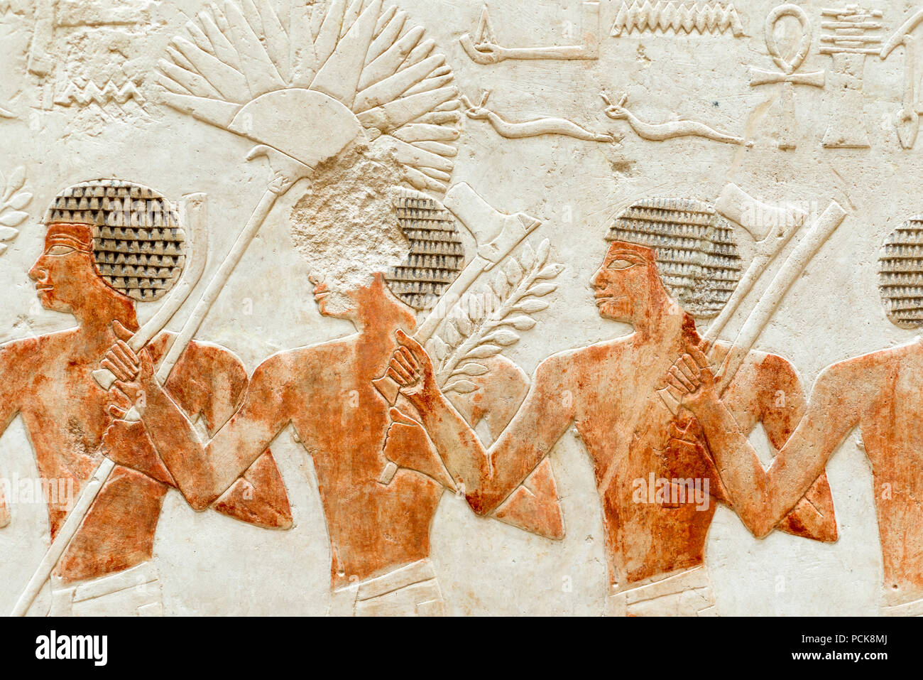 ancient Egyptian wall relief with people figures bringing tools Stock ...