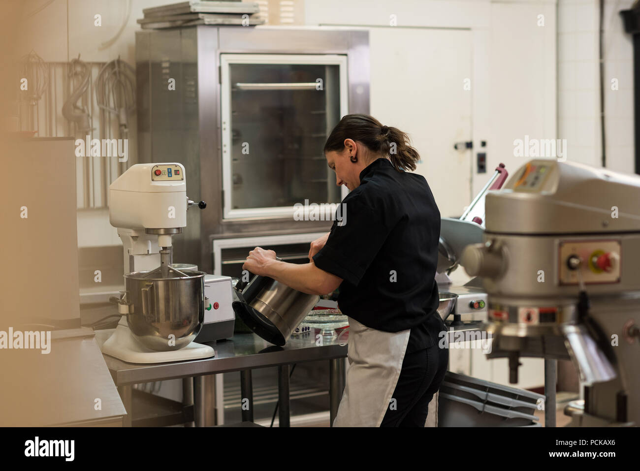 Chef working in the kitchen Stock Photo - Alamy