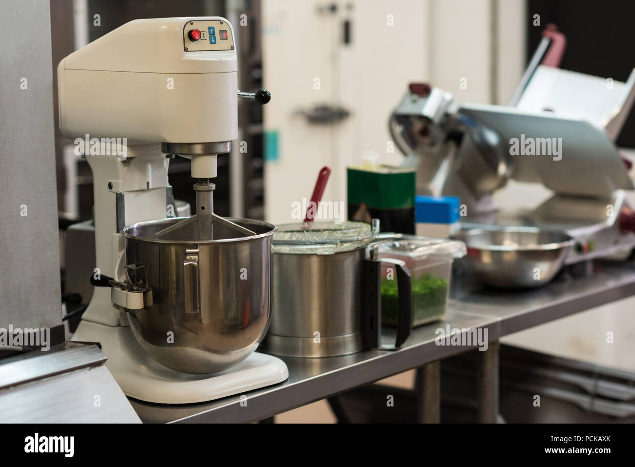 Whisking machine and other appliances on the counter Stock Photo - Alamy