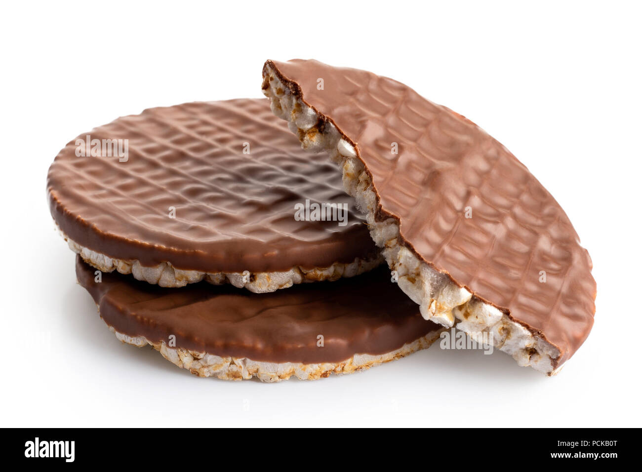 Pile of two and half chocolate rice cakes isolated on white Stock Photo ...