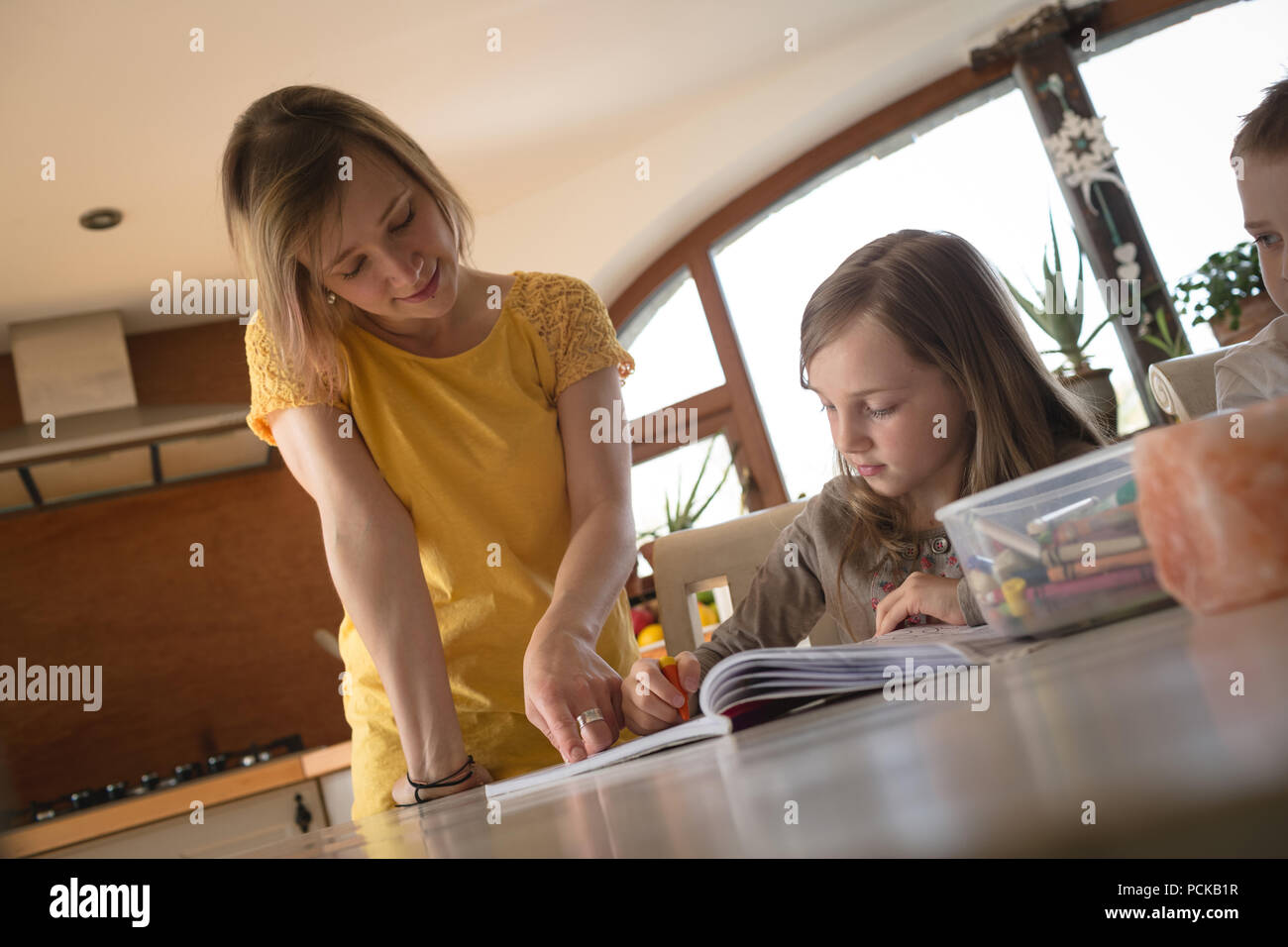 Mother teach child write hi-res stock photography and images - Alamy