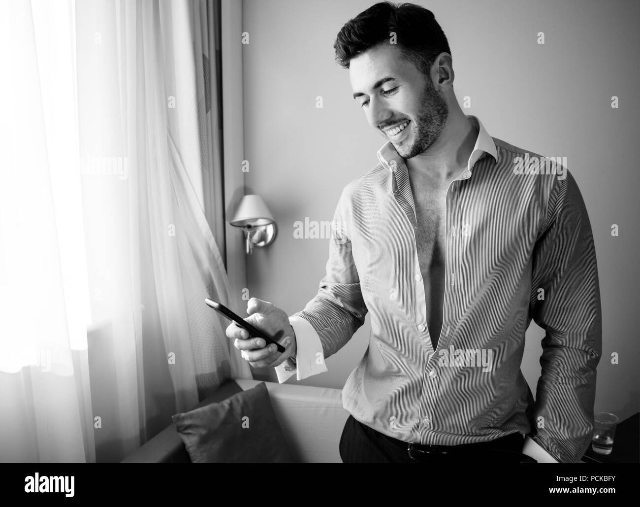 Business excecutive, professional man using mobile , cell phone device ...