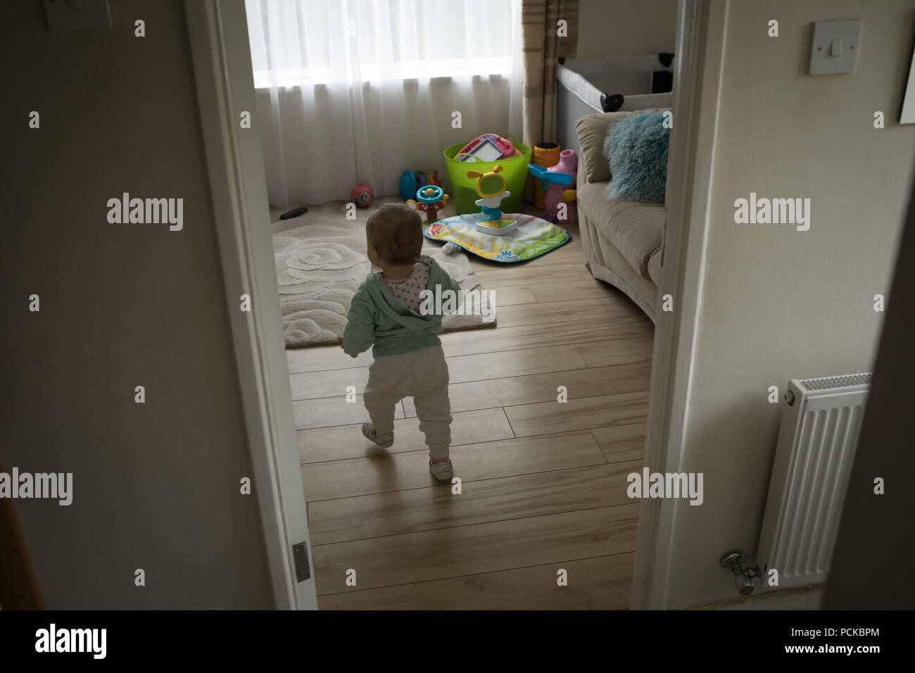 Baby girl running hi-res stock photography and images - Alamy