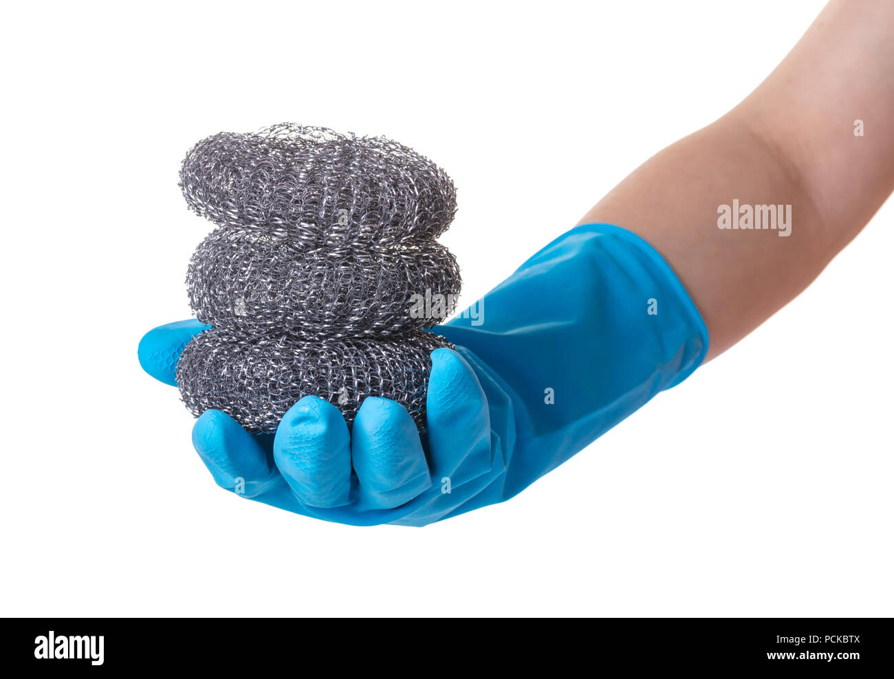 metal sponge for utensils in a female hand on white isolated background ...