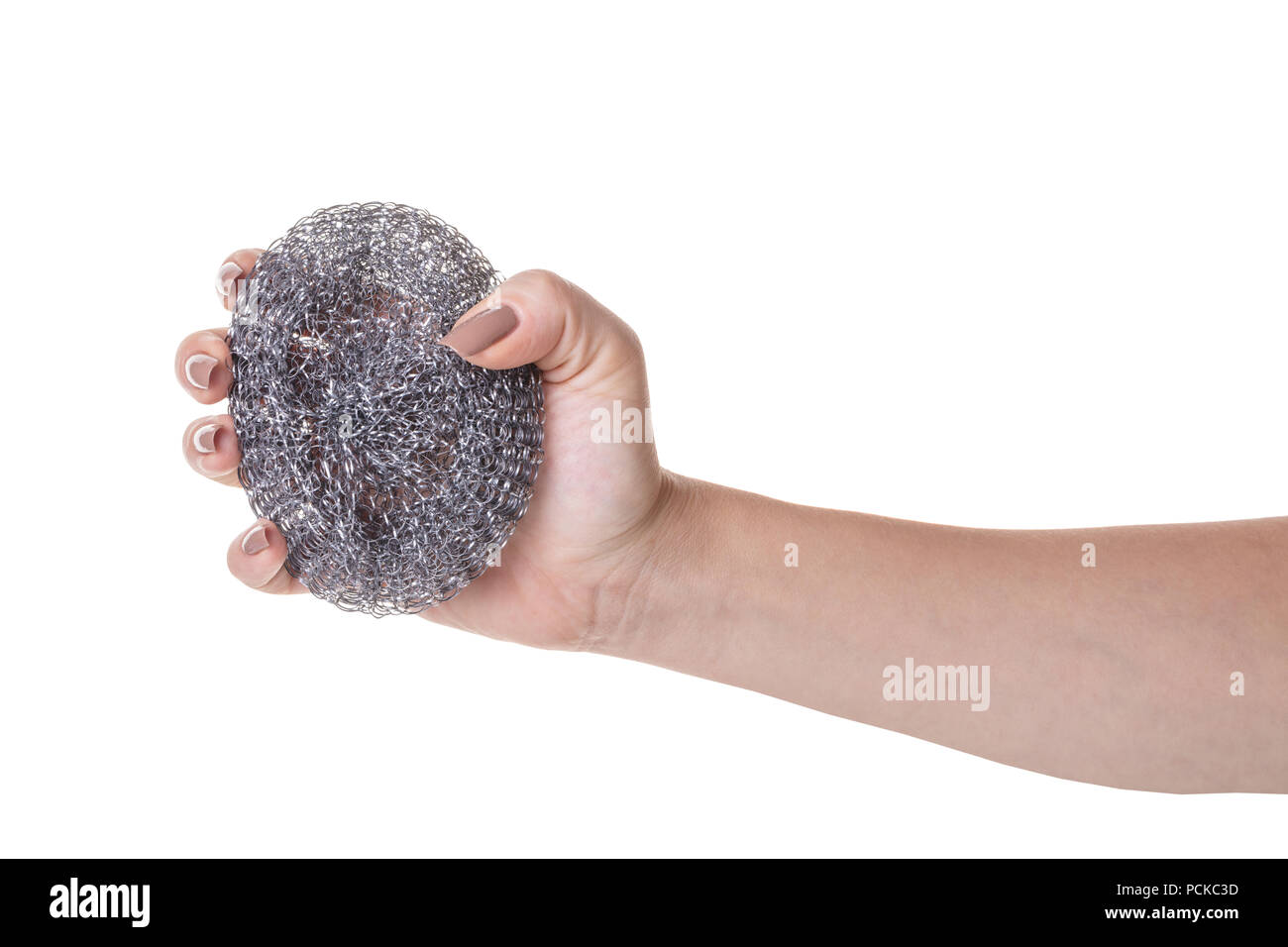 metal sponge for utensils in a female hand on white isolated background ...