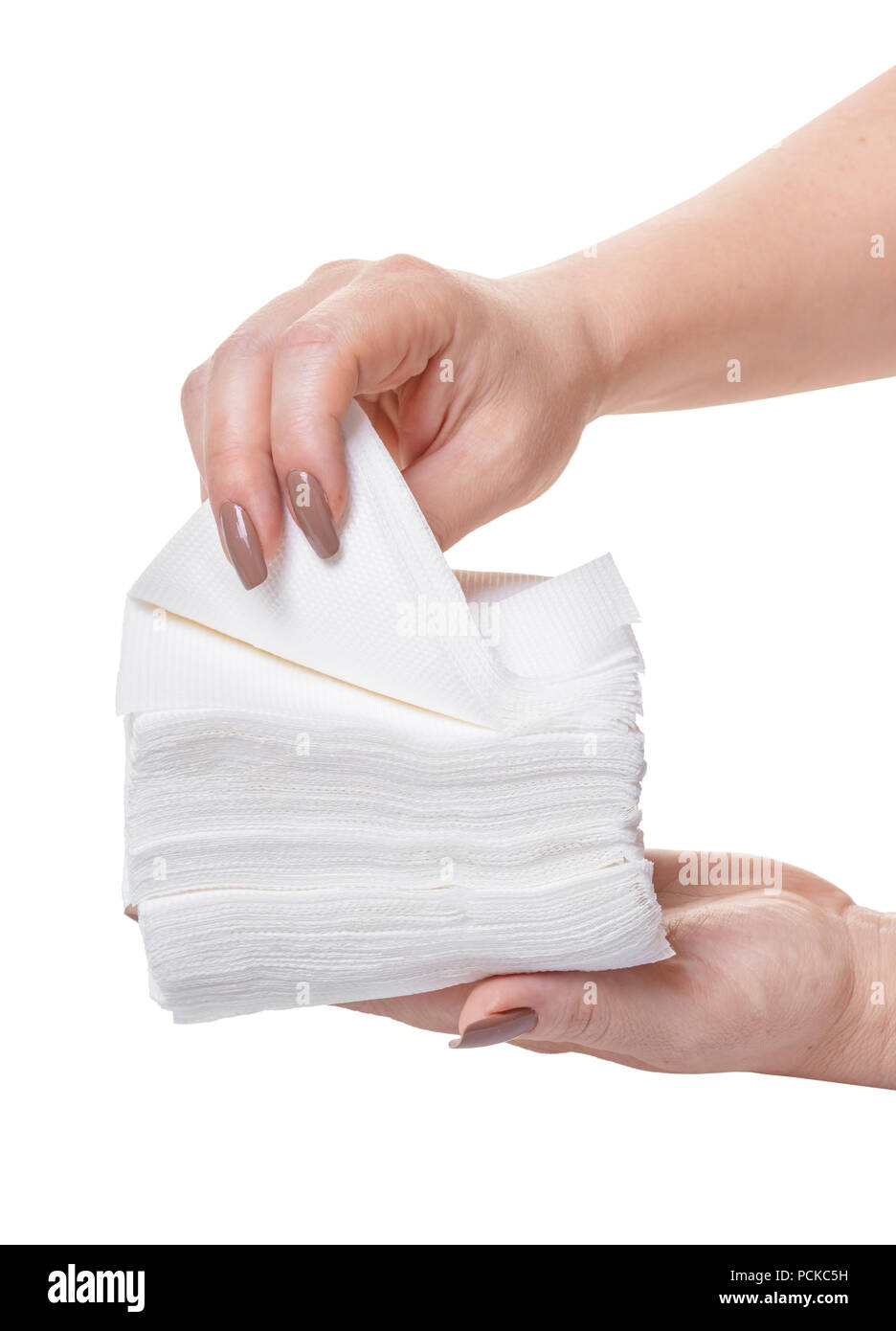 pack of napkins in hands on white background isolated Stock Photo - Alamy
