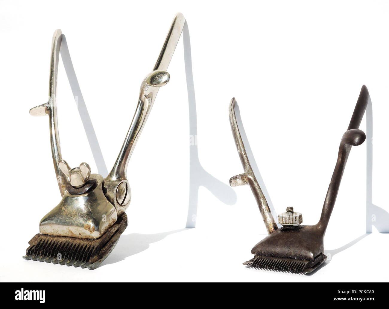 Two vintage manual cut hairs since 1945 Stock Photo - Alamy