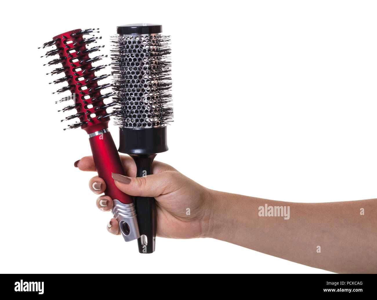 hair comb in female hand on white isolated background Stock Photo - Alamy