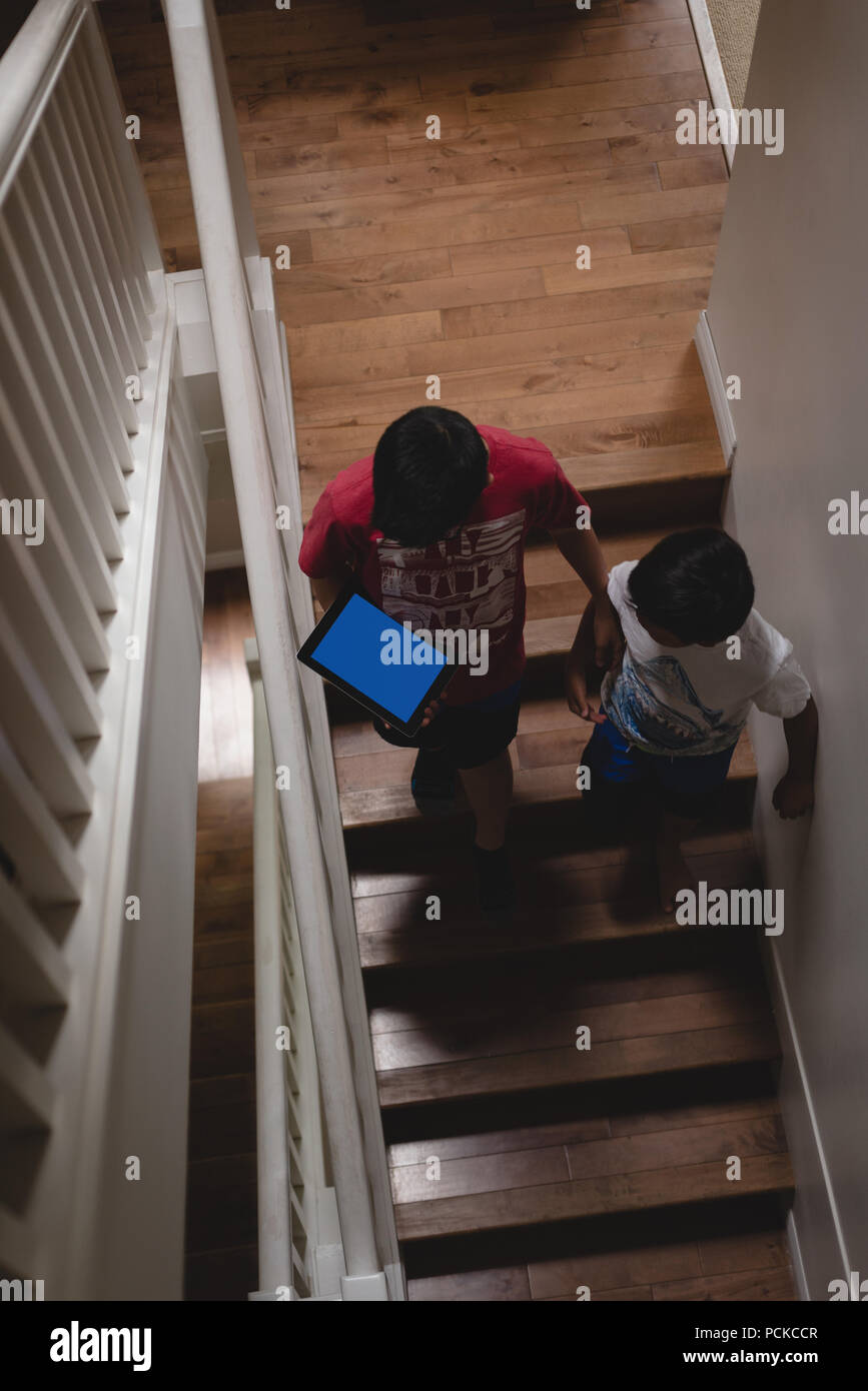 Walking with tablet hi-res stock photography and images - Alamy