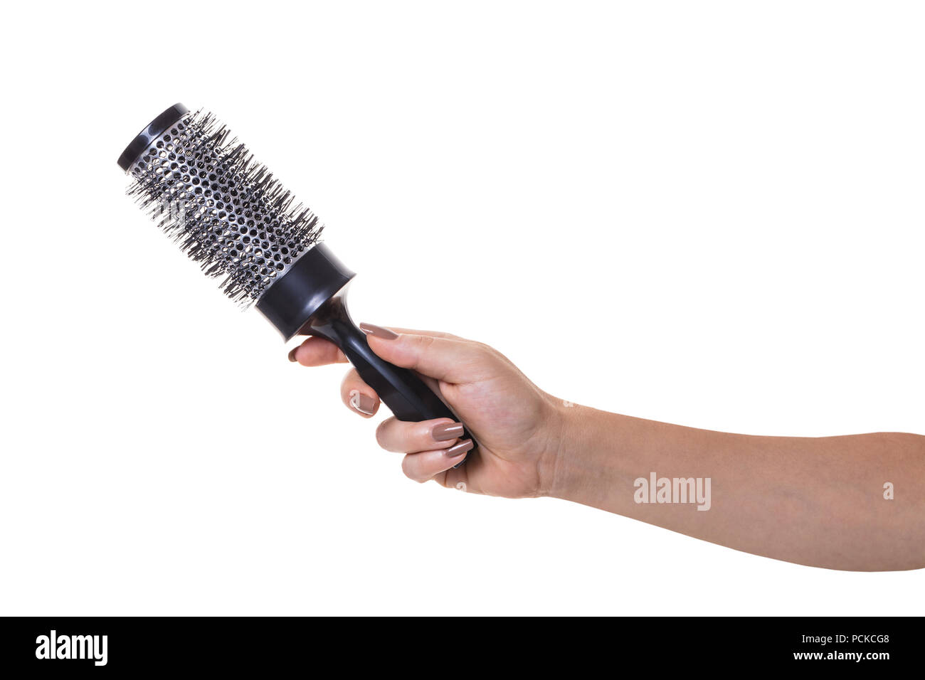 hair comb in female hand on white isolated background Stock Photo - Alamy
