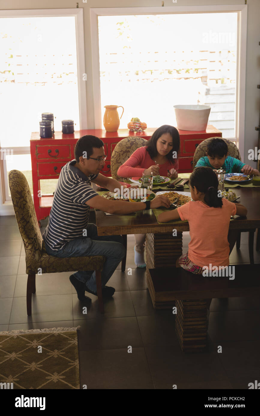 Chinese family eating together hi-res stock photography and images - Alamy
