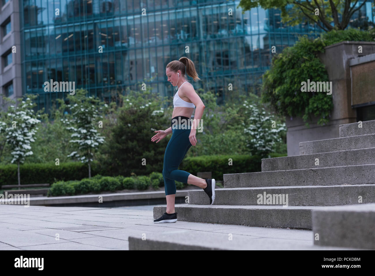 Woman jogging street city hi-res stock photography and images - Alamy