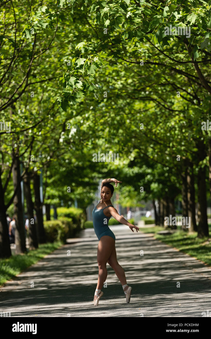Female ballet dancer dancing on the road Stock Photo - Alamy