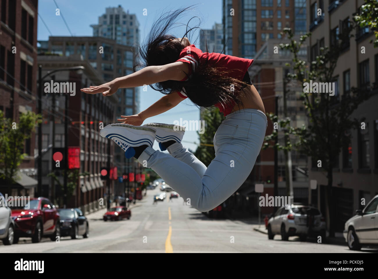 Female street dancer dancing in the street Stock Photo - Alamy