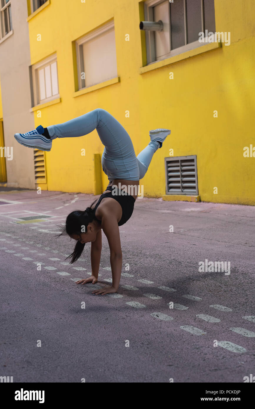 Female street dancer dancing in the street Stock Photo - Alamy