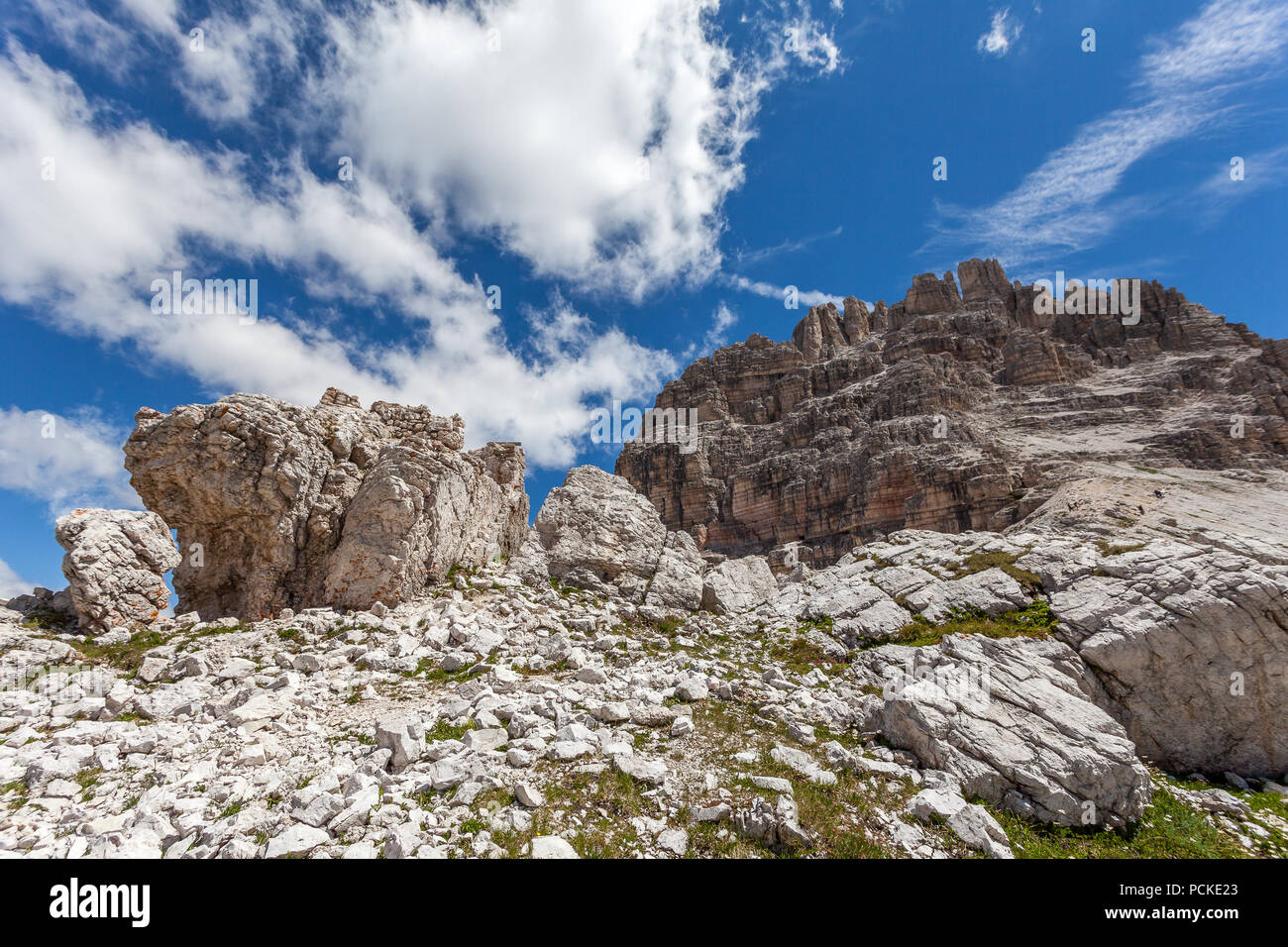 Large boulder at the foot of beautiful dolomitic pinnacles, Mount ...