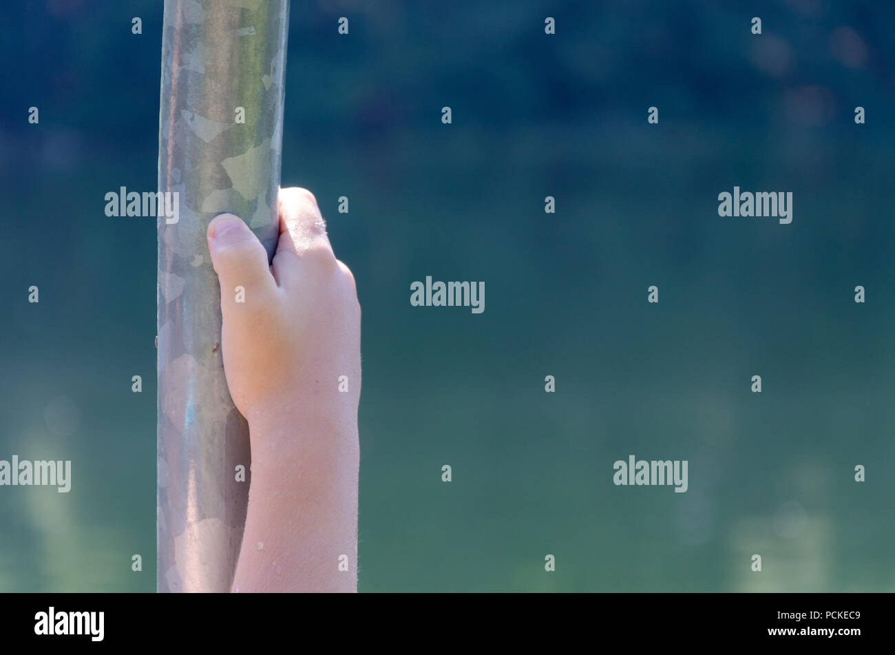 small hand closeup with blurry background. Nice landscape of german ...