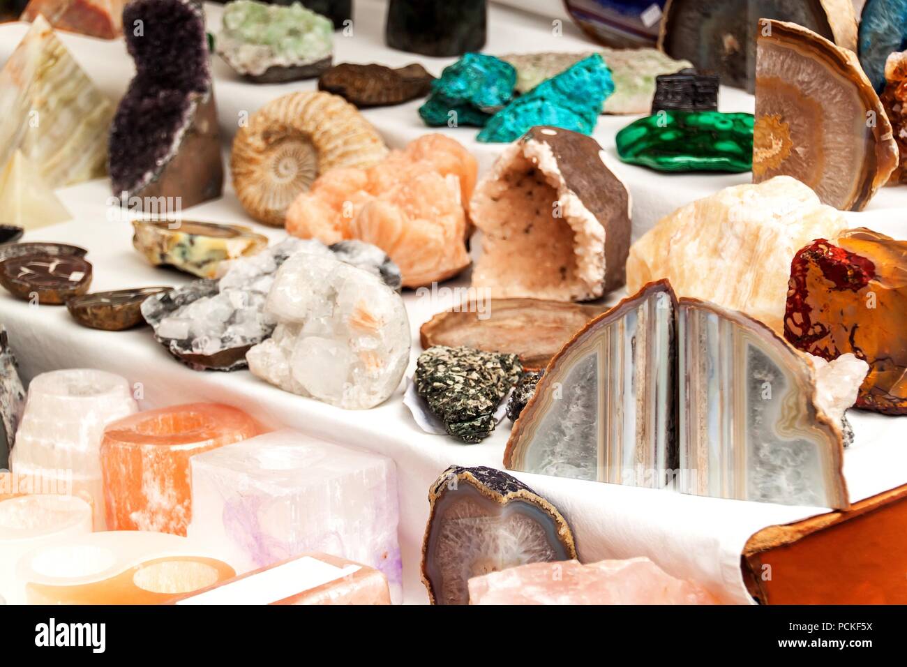 Selling mineral at the market. Decorative stones. Different types of ...