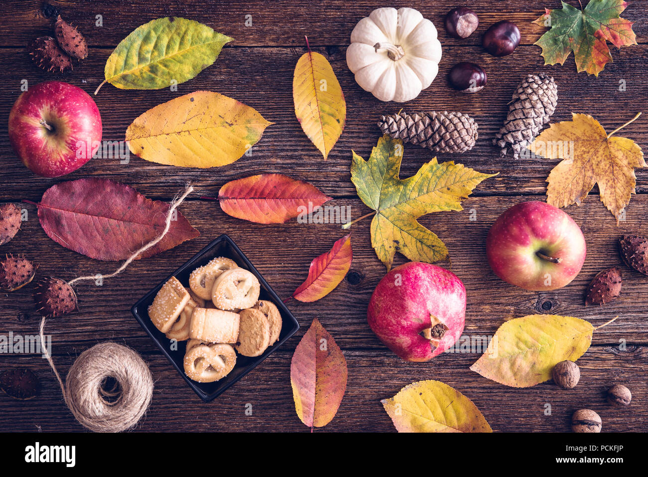 Autumn still life concept background. Fall leaves, harvest, goodies on ...