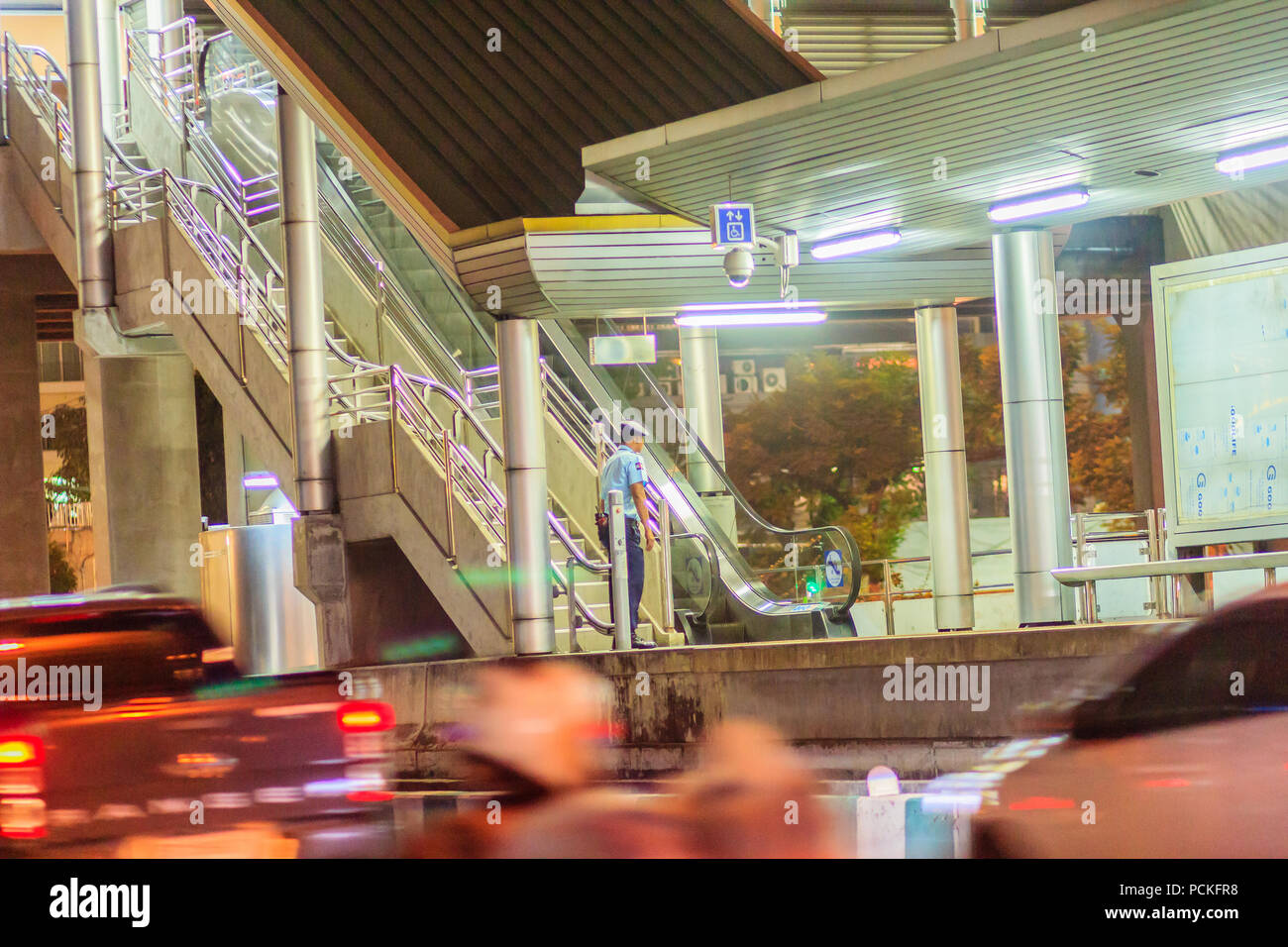 Bangkok, Thailand - January 30, 2017: Late night security guard at Bus ...