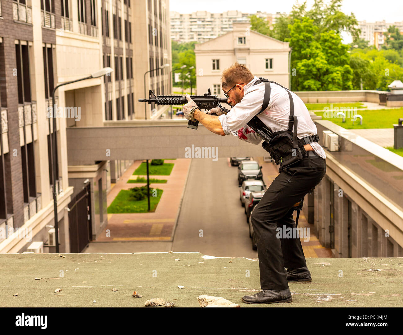 man took aim with the pistol. Action Movie Style Stock Photo - Alamy