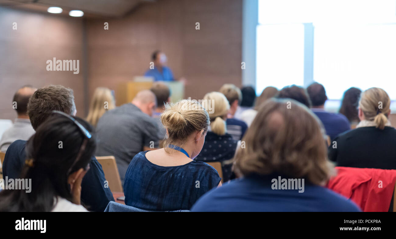 Speaker giving presentation on health care conference Stock Photo - Alamy