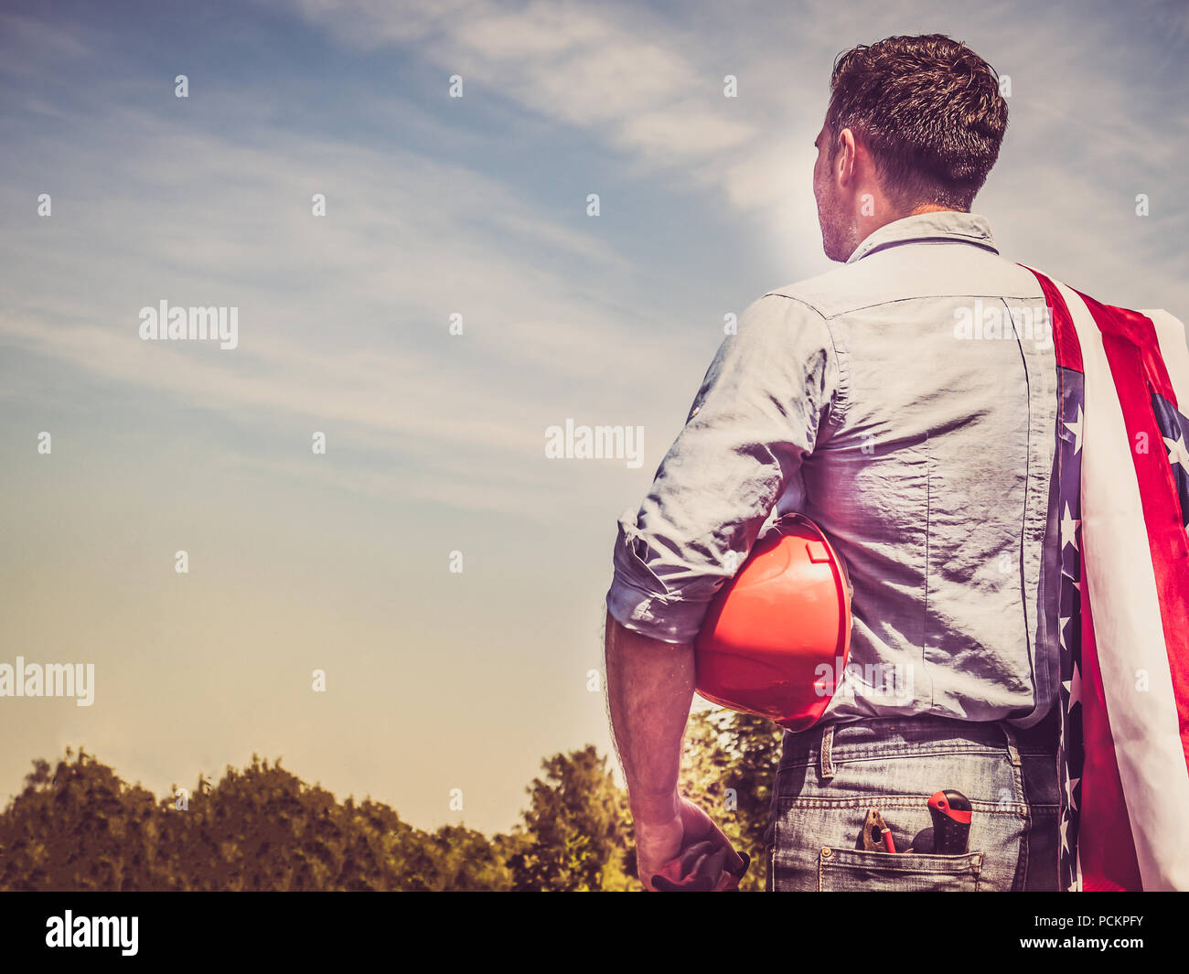 Attractive man in work clothes Stock Photo - Alamy