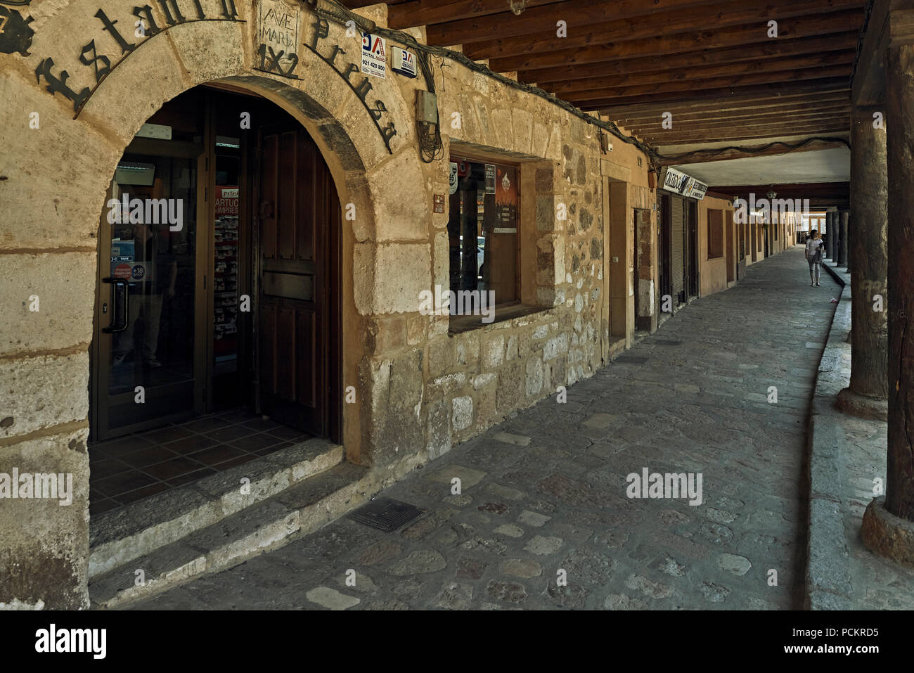 Old arcades of the main square of the town of Ayllon, town of Segovia ...
