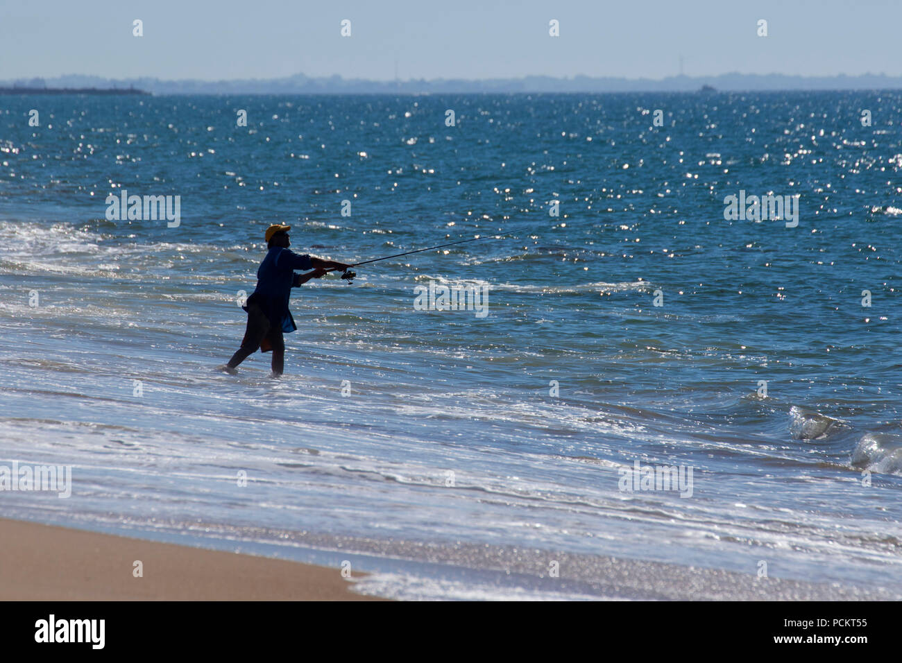 Surf fishing on East Beach, Ninigret Conservation Area, Rhode Island ...