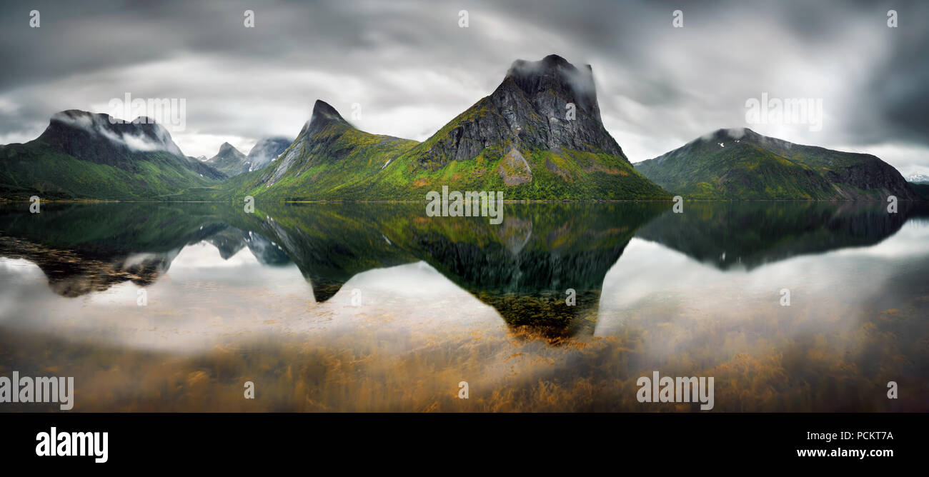 Panorama of Steinfjorden among mountains and forest on Senja Island ...