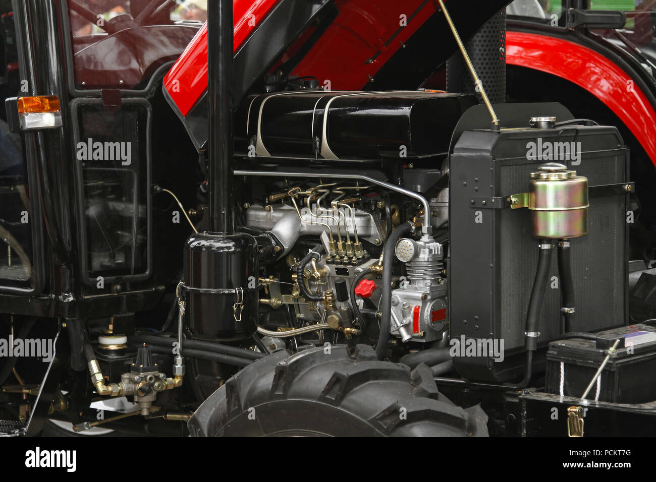 Diesel power engine at new tractor Stock Photo - Alamy