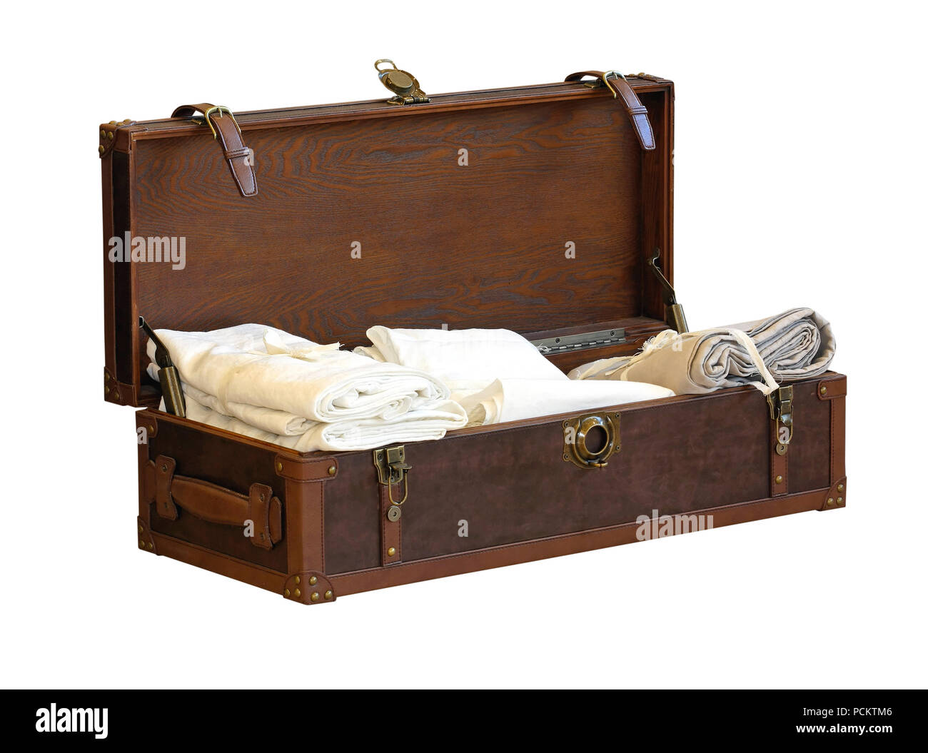 Open trunk with sheets isolated included clipping path Stock Photo - Alamy