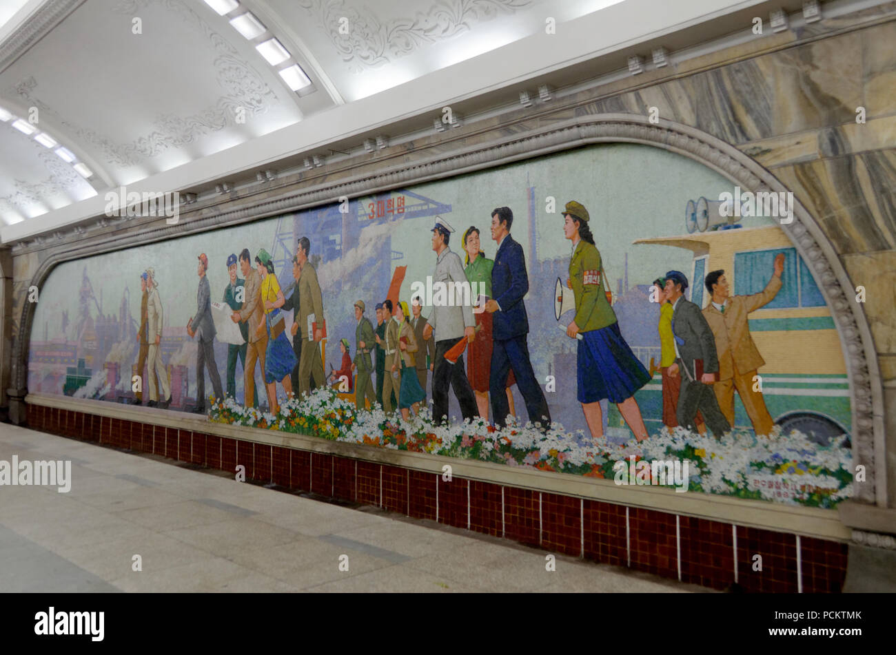 Murals painted on the walls of the Pyongyang Metro showing ...