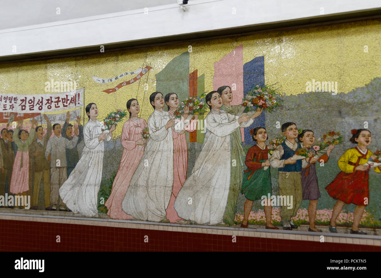 Murals painted on the walls of the Pyongyang Metro showing ...