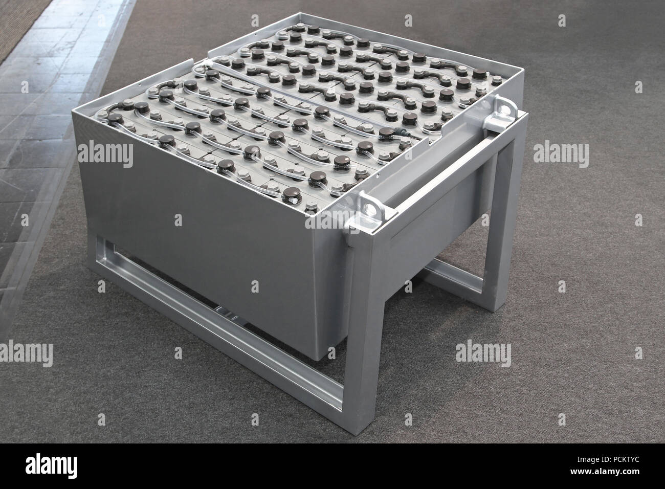 Big battery pack in frame for forklift Stock Photo - Alamy