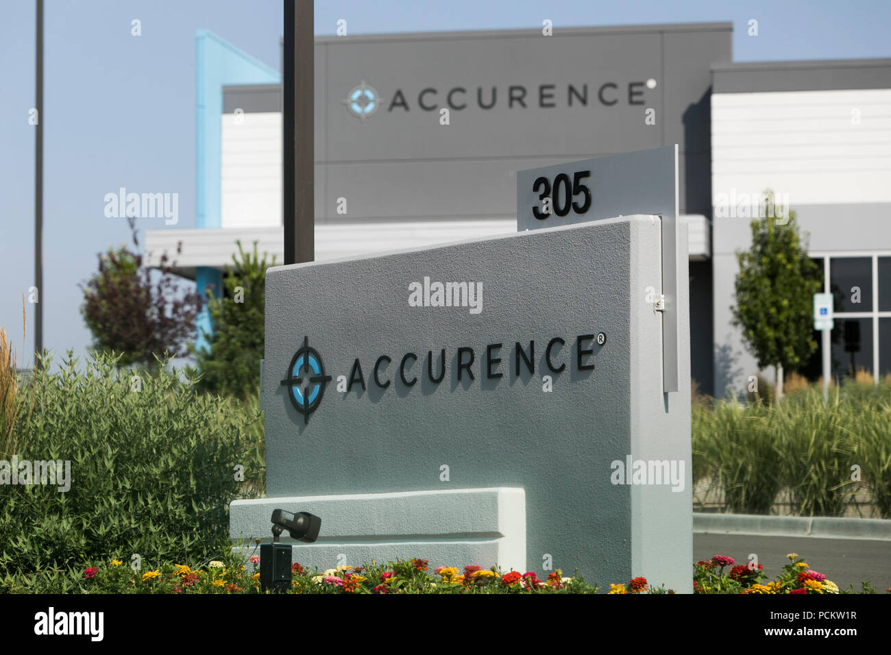 A logo sign outside of the headquarters of Accurence in Louisville ...