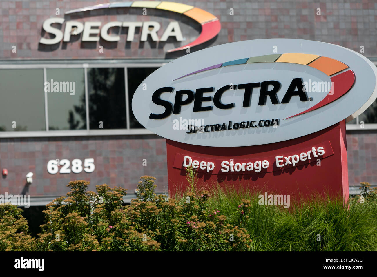 A logo sign outside of the headquarters of Spectra Logic in Boulder ...