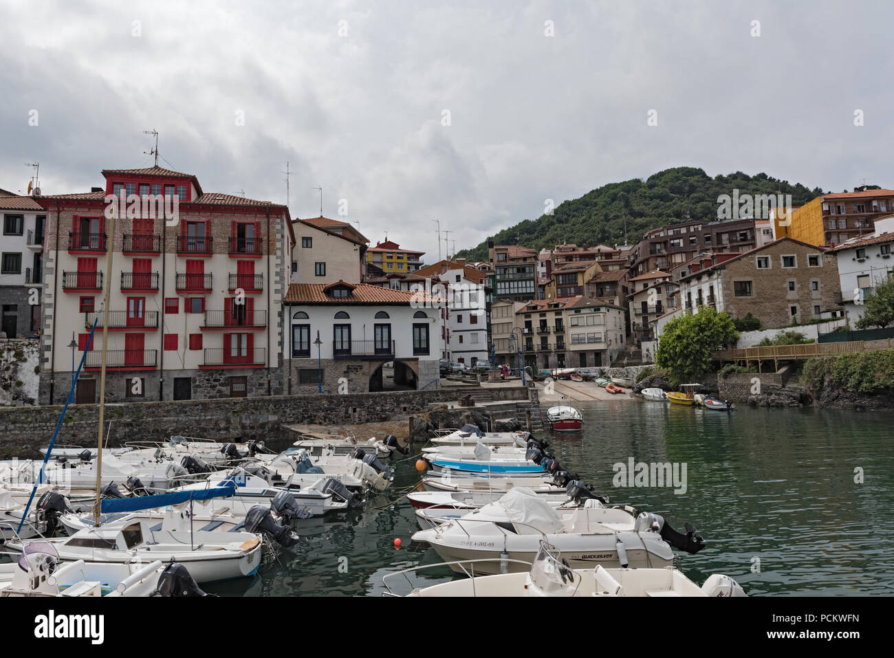 Boats in the harbor of the small Basque town of Mundaka on the ...