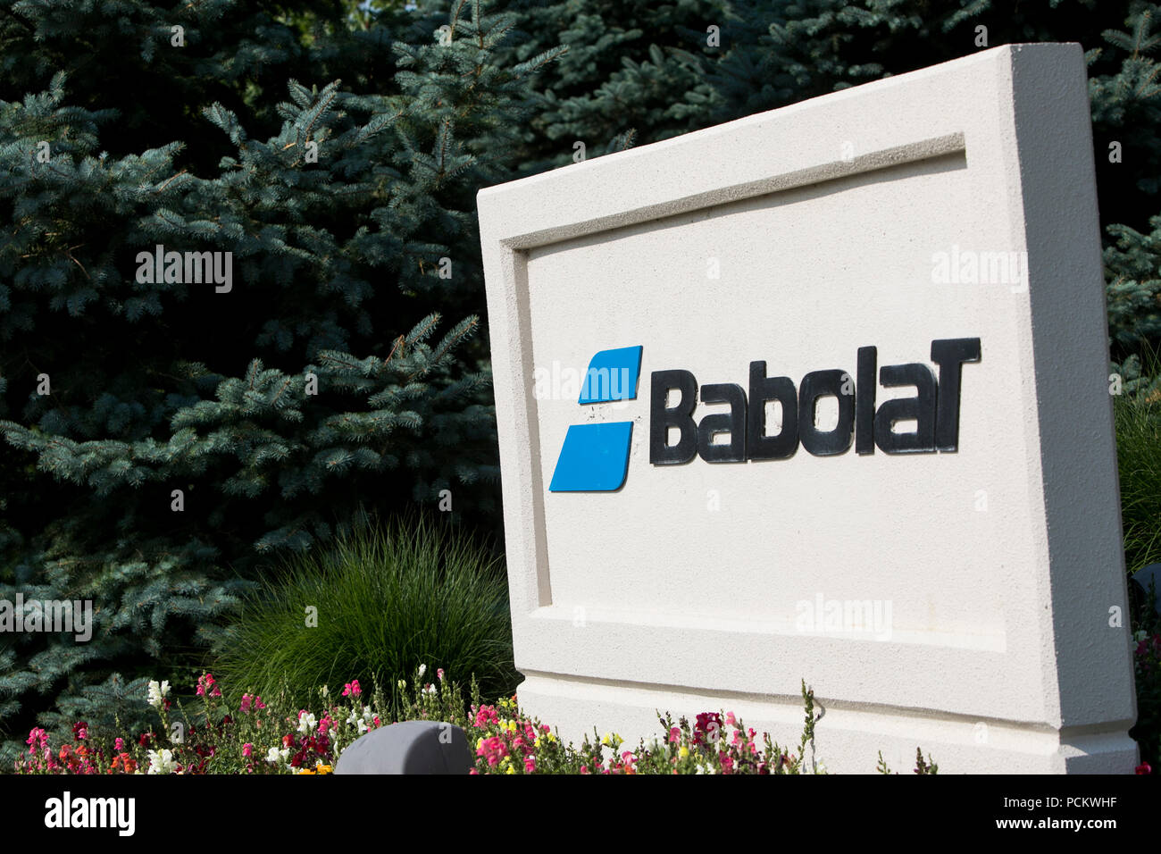 A logo sign outside of a facility occupied by Babolat in Louisville ...